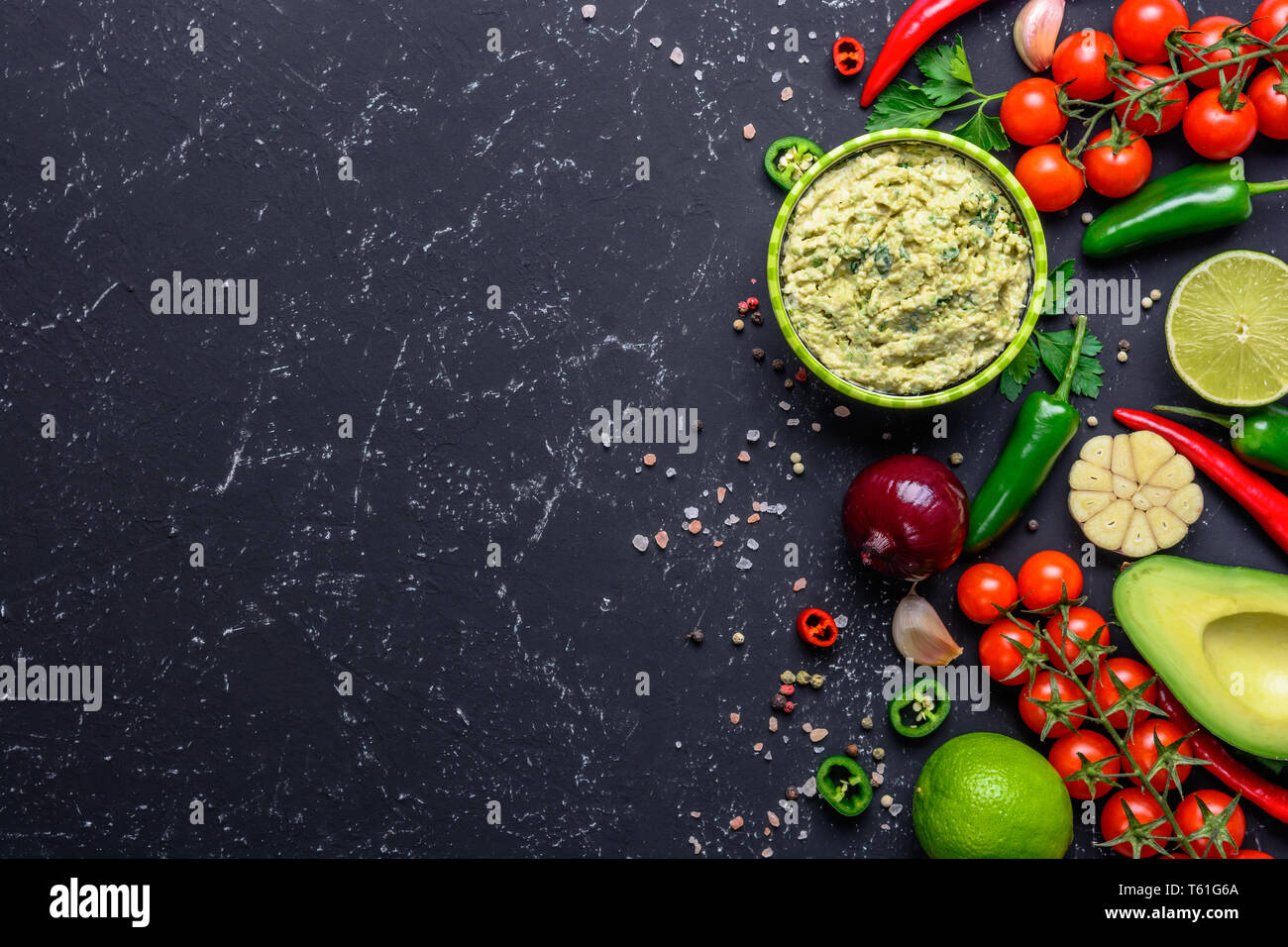 Traditional Mexican Latin American sauce Guacamole and ingredients on ...