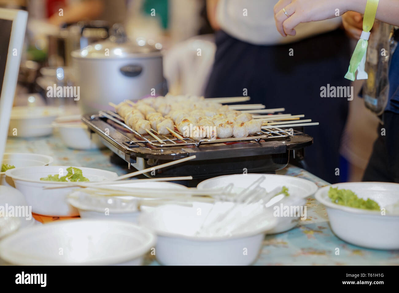 grilled meat ball on the elctric grilling Stock Photo - Alamy