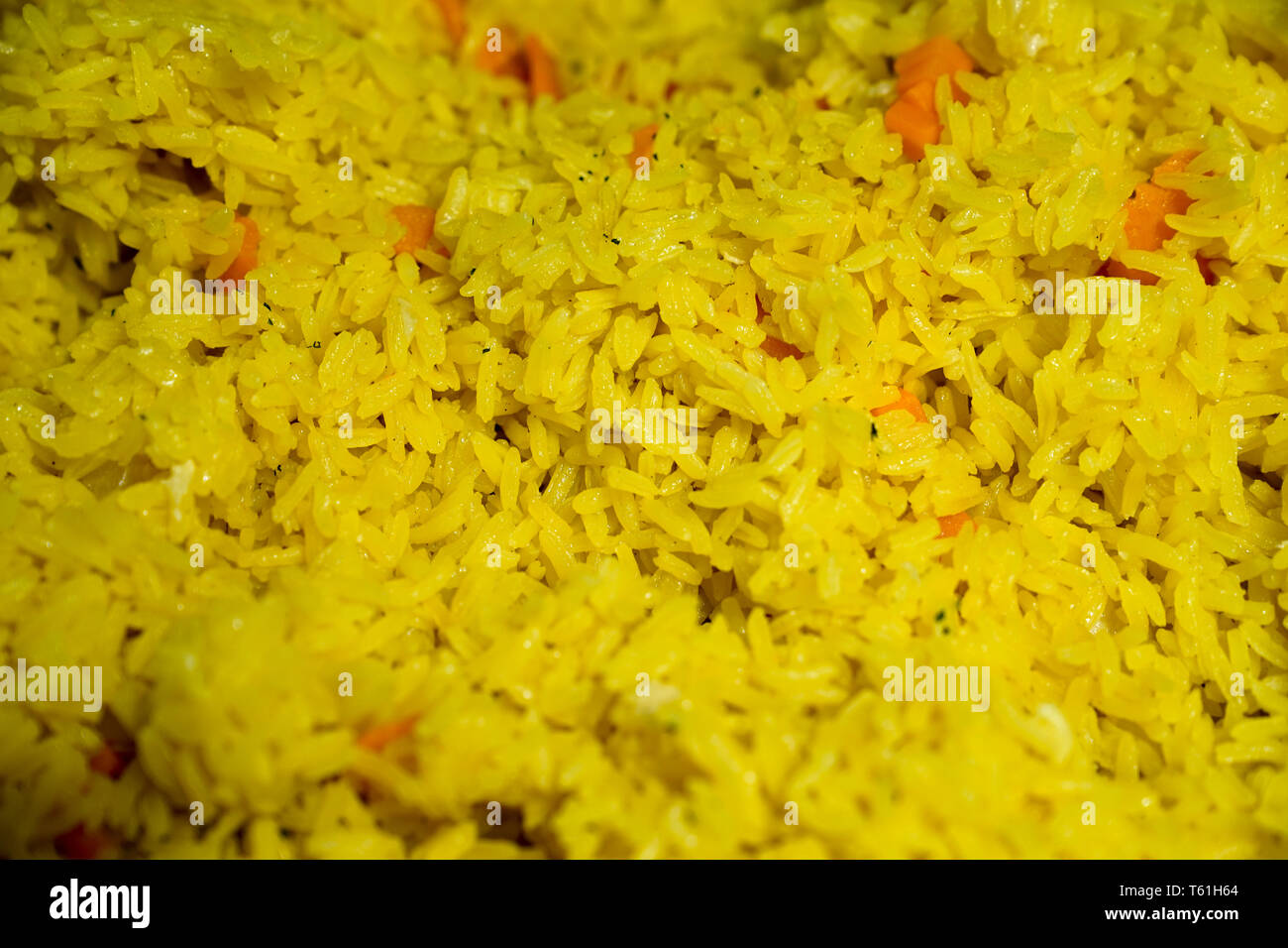 yellow curry rice, ready to eat Stock Photo - Alamy