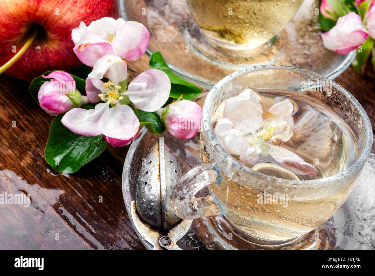 Red apples on wooden board.Cup of apple tea Stock Photo - Alamy