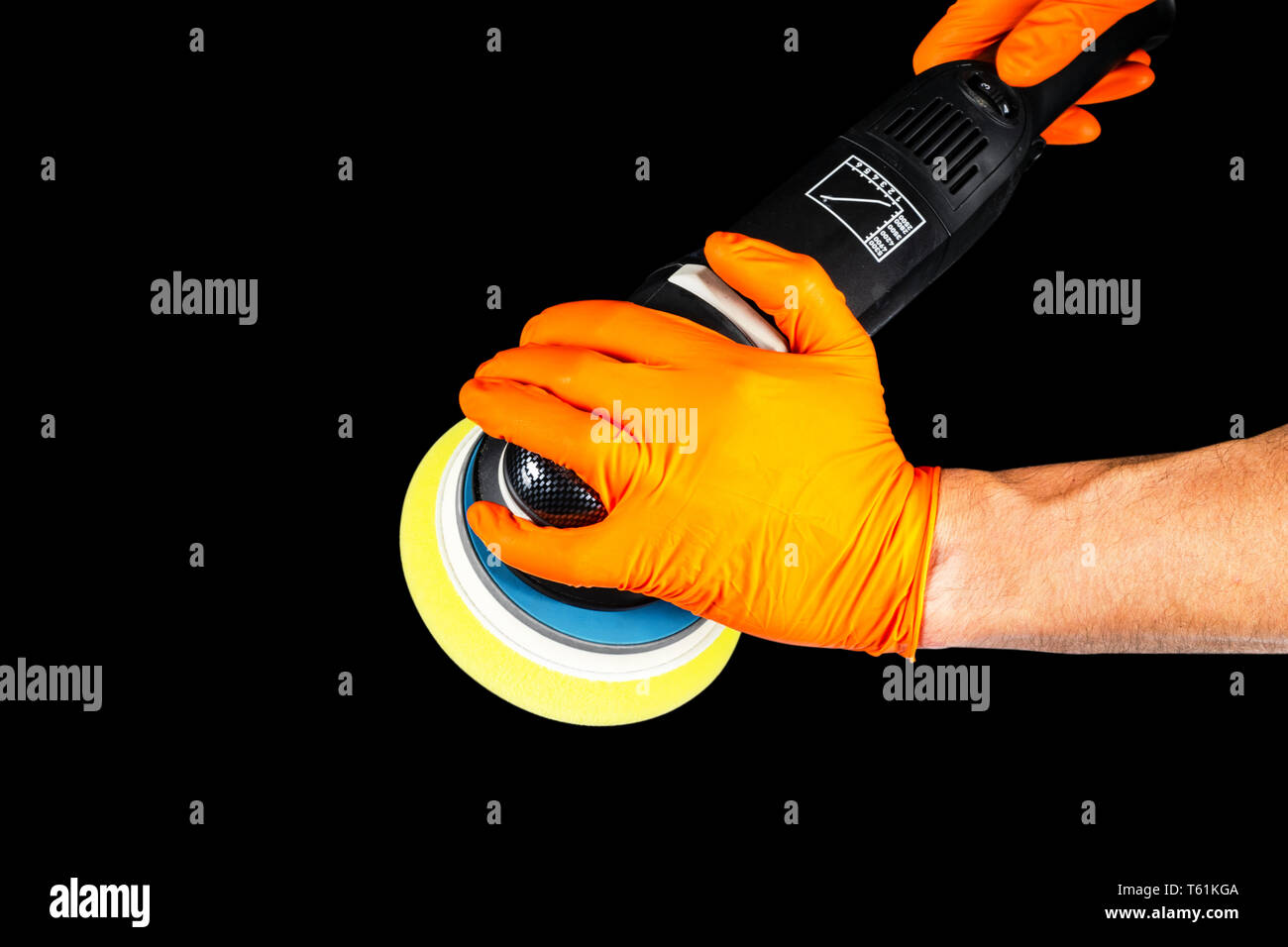 Car polish wax worker hands withs tools isolated on black background ...