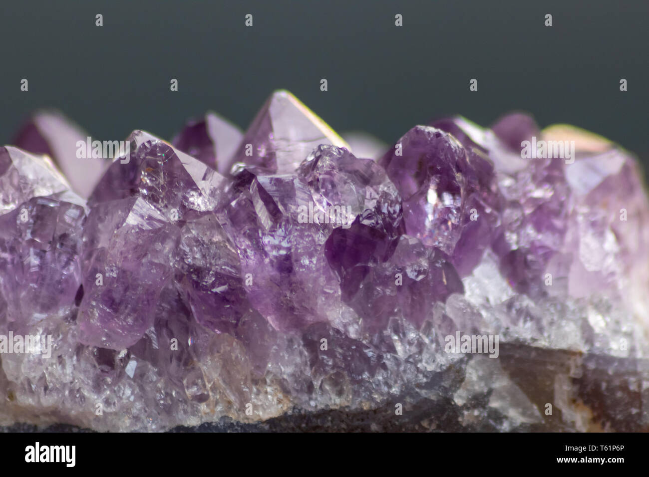 Beautiful pink amethyst gemstone as close-up macro view with details of ...