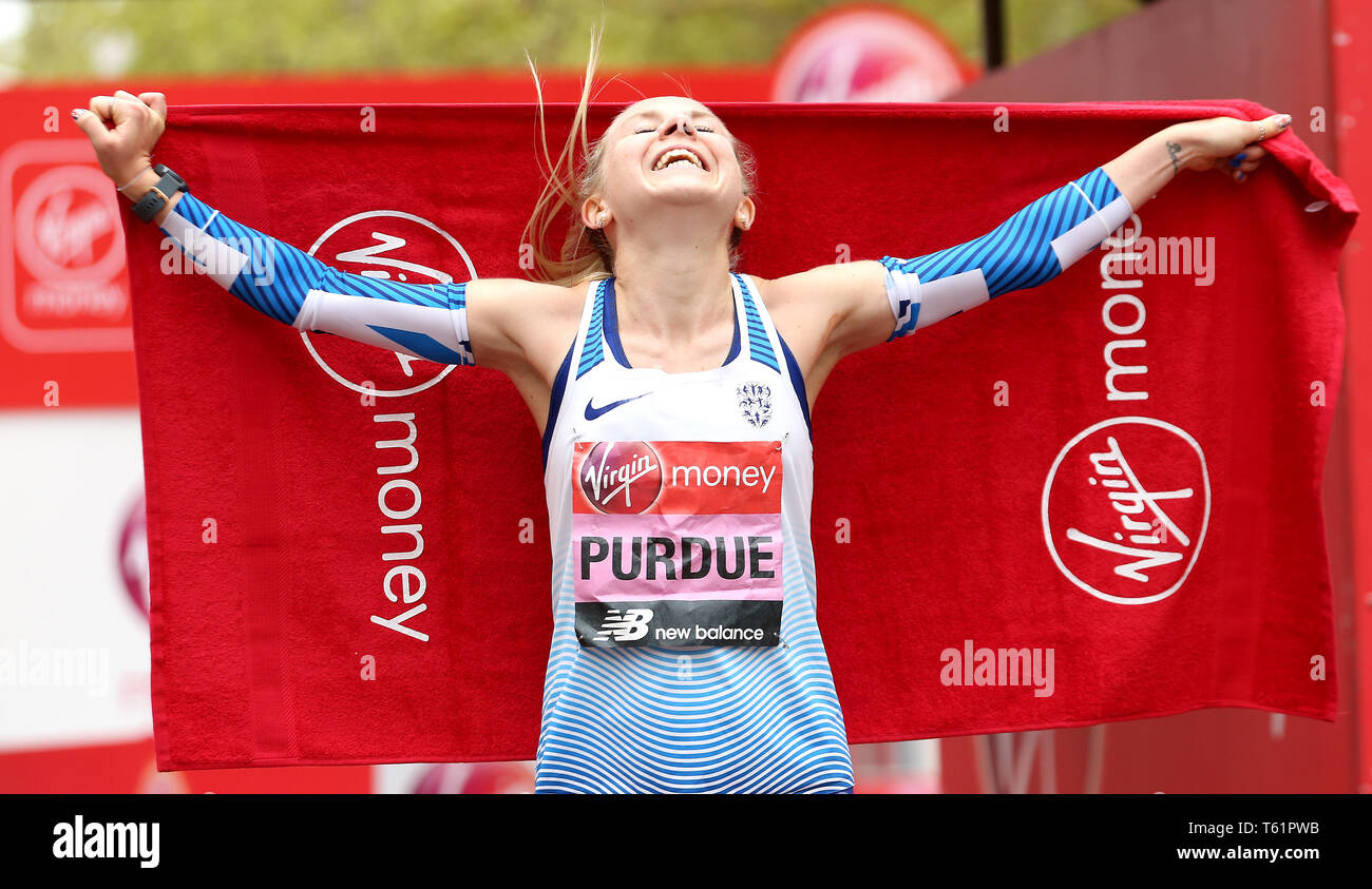Great Britain's Charlotte Purdue celebrates after crossing the line in ...