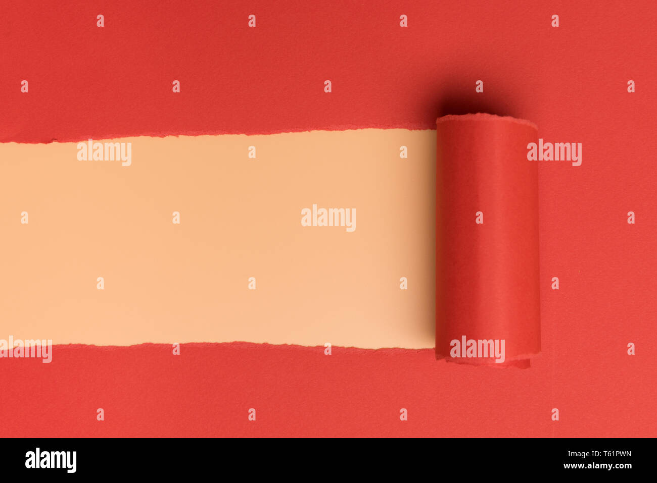 Red torned paper over yellow background Stock Photo - Alamy