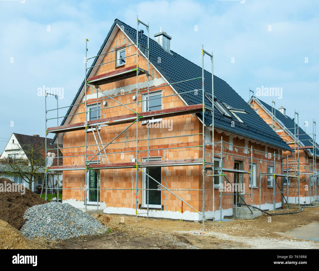 new built house in construction Stock Photo - Alamy