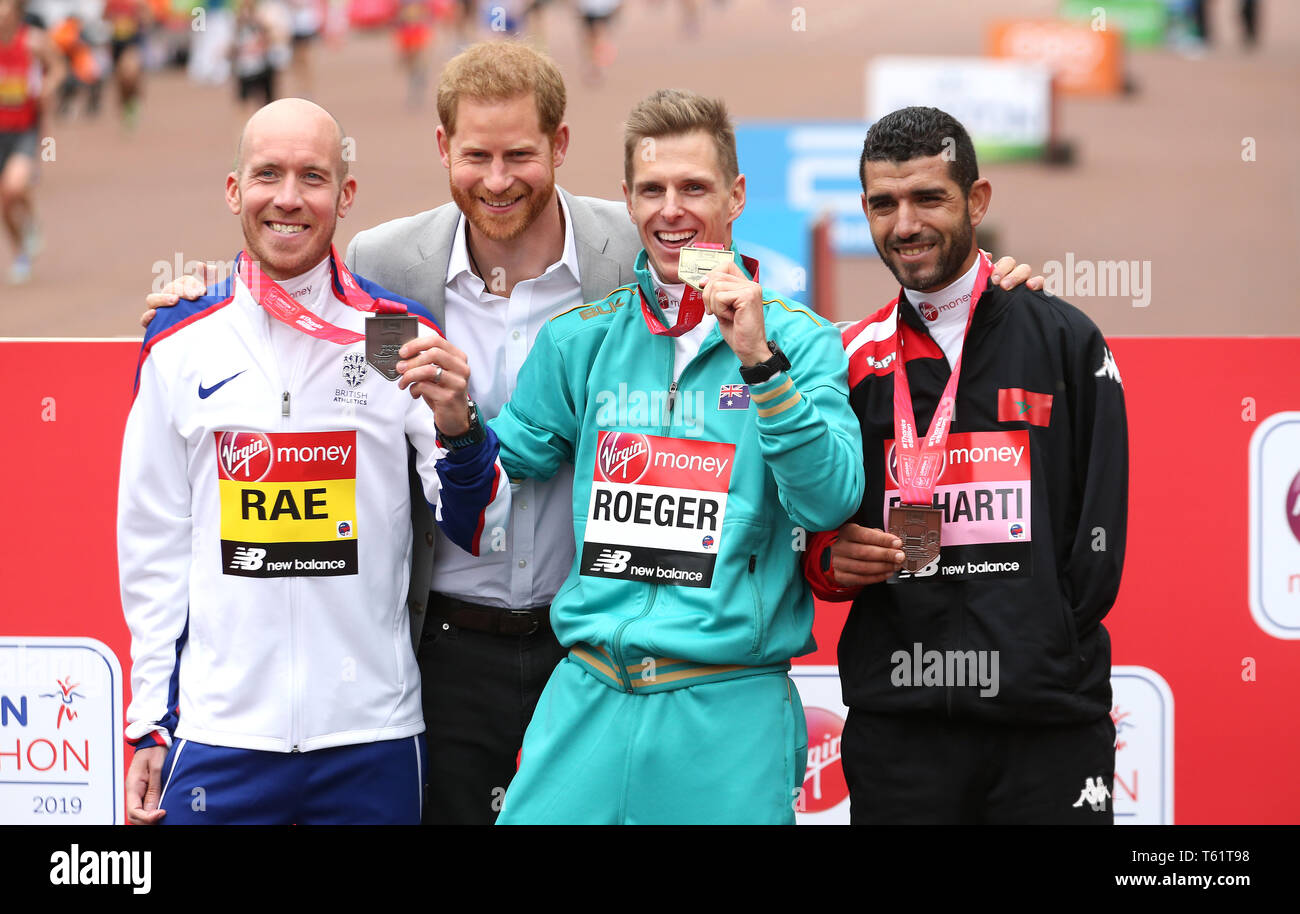 The Duke of Sussex poses for a picture with Great Britain's Derek Rae ...