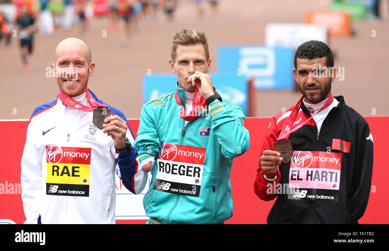 Great Britain's Derek Rae (left), Australia's Michael Roeger and El ...