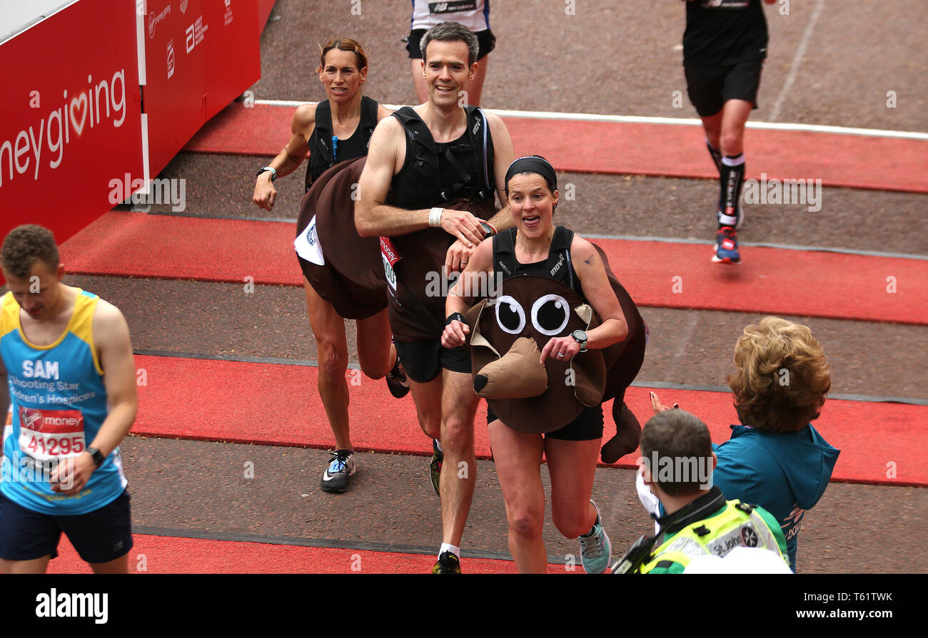 Runners in fancy dress cross the line during the 2019 Virgin Money ...