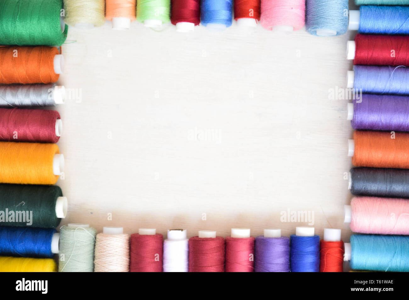 threads on a white background Stock Photo - Alamy