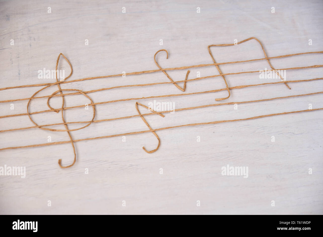 Set of musical notes isolated on white wooden background Stock Photo ...