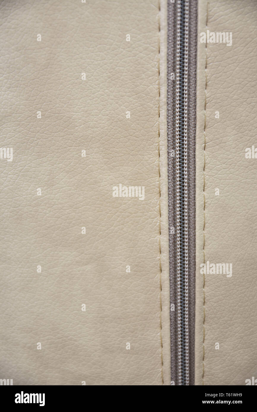 beige texture with zipper Stock Photo - Alamy