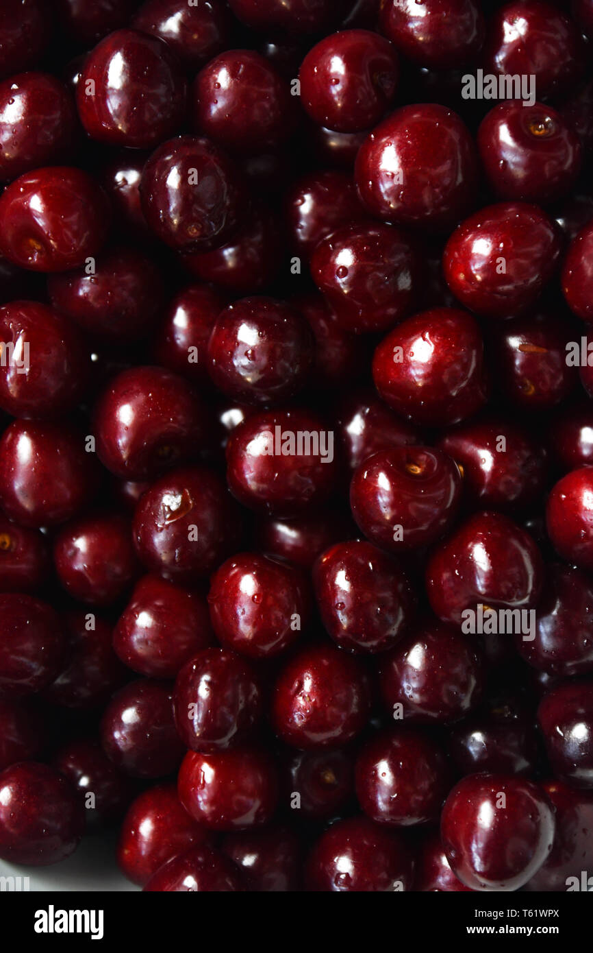 Sweet cherry background Stock Photo - Alamy