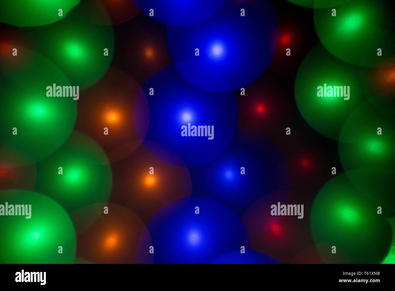 Decorative multi color christmas lights on a black background Stock ...