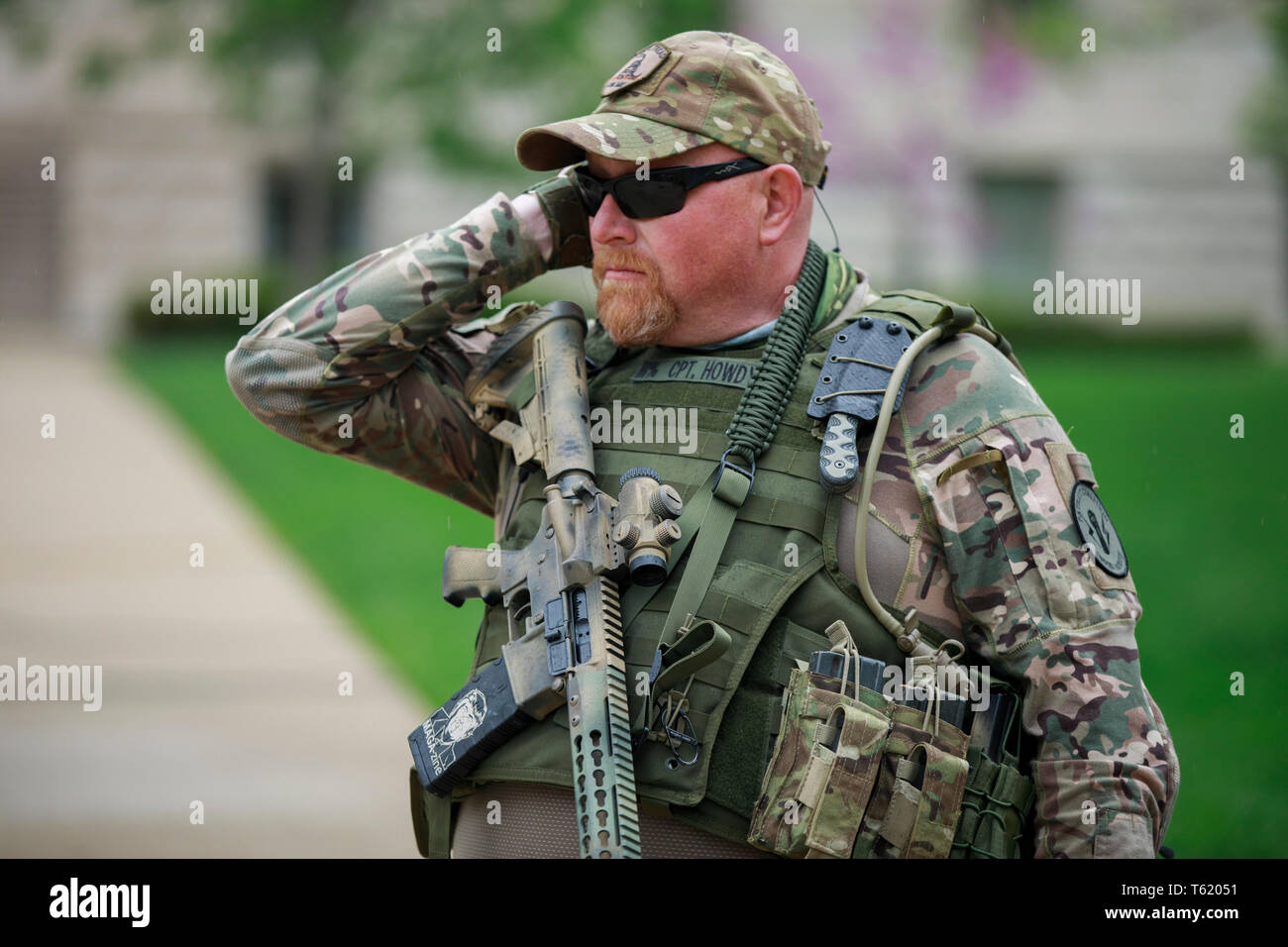 A member of the AAF III% militia does security during the Pro-Freedom ...