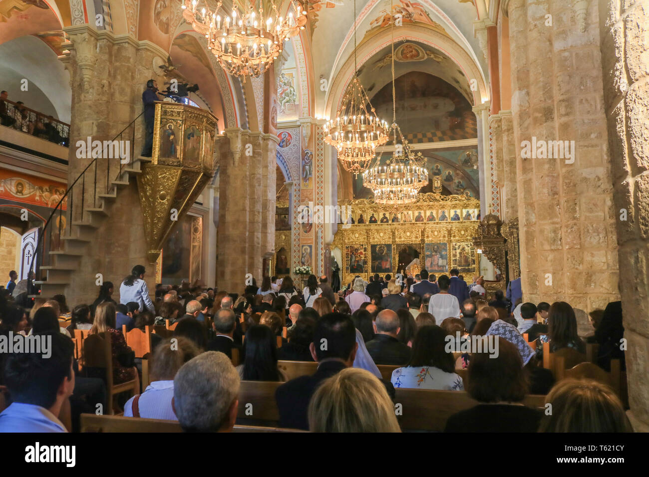 Beirut, Lebanon. 28th Apr, 2019. Worshippers pack Saint George Orthodox ...
