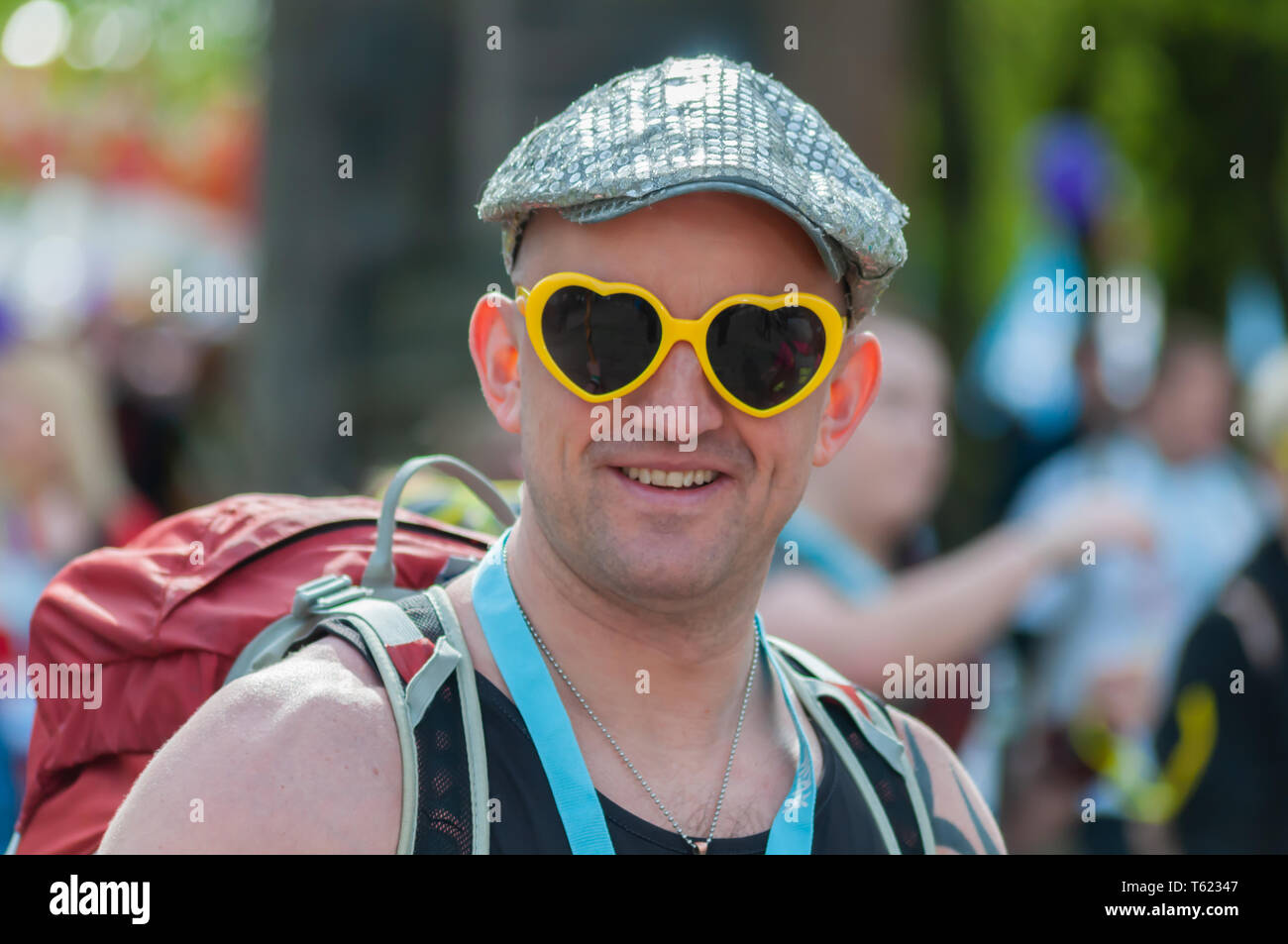 Glasgow, Scotland, UK. 28th April, 2019. A smiling male walker wearing ...