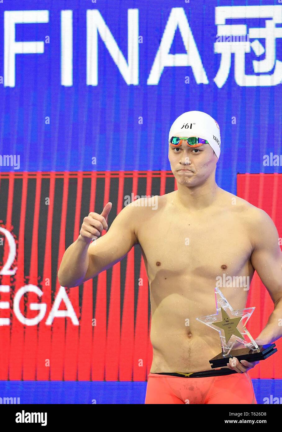 Guangzhou,China. 28th Apr, 2019. Sun Yang of China is awarded after ...