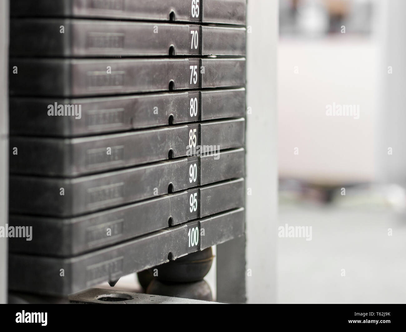 Stack of rusty metal weights in gym bodybuilding equipment ...