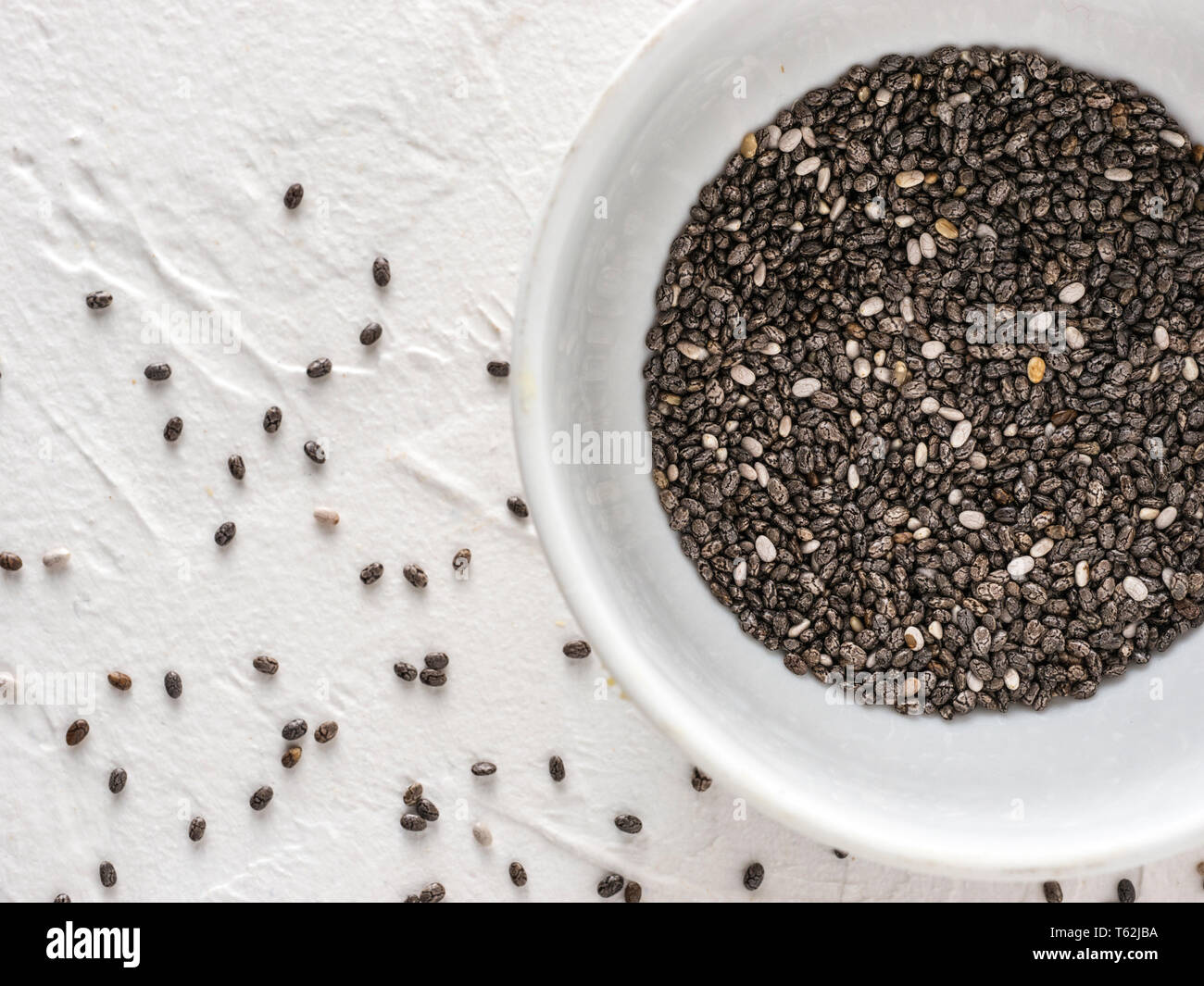 Chia seeds with copy space. Chia seed on white concrete textured ...