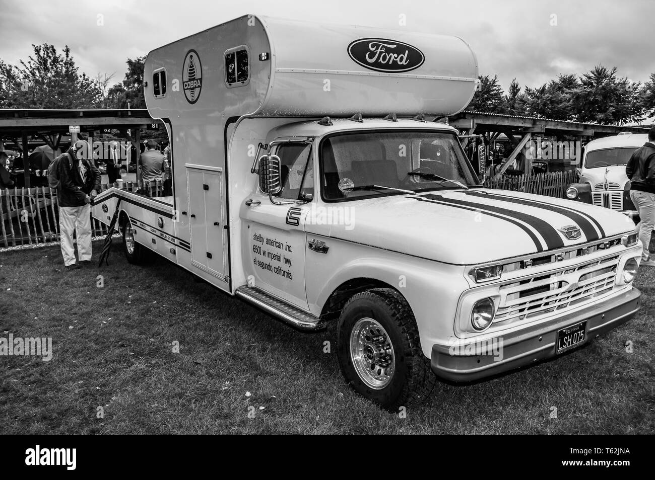 A 1966 Ford F250 Shelby rase car transporter on display at Goodwood ...