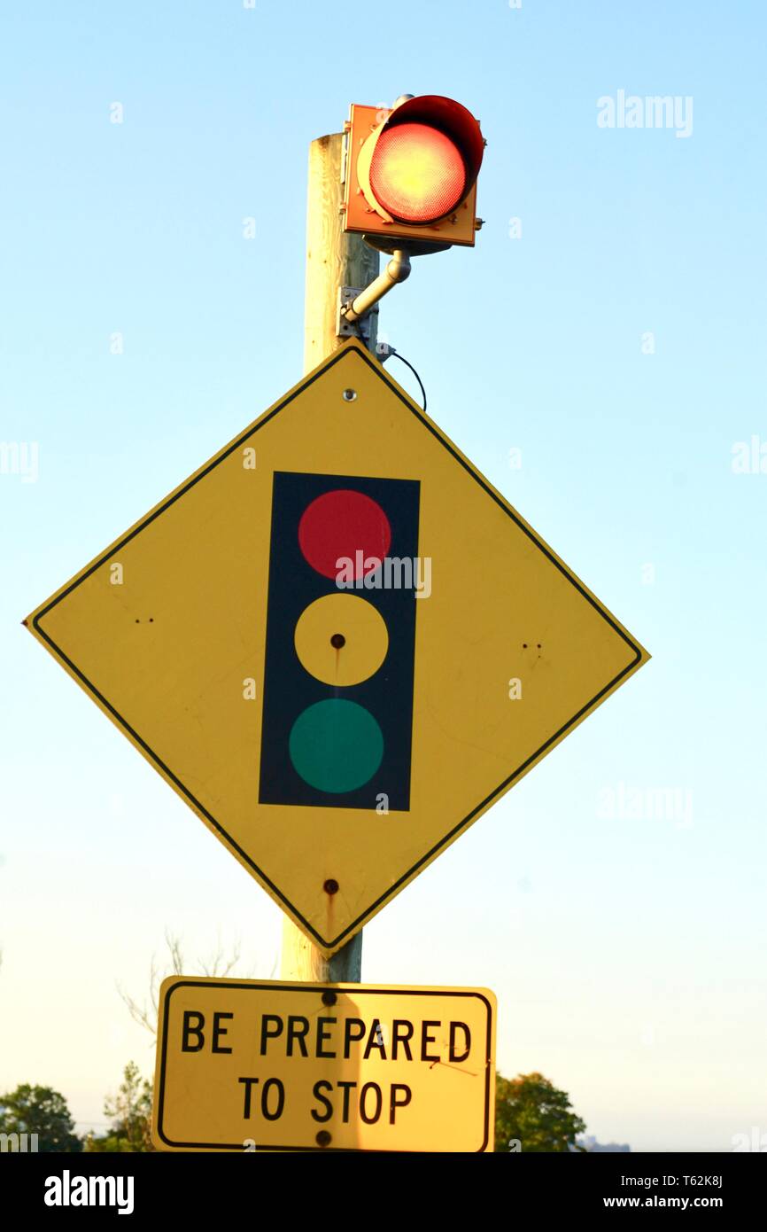 a nice look at a warning sign and a light for drivers Stock Photo - Alamy