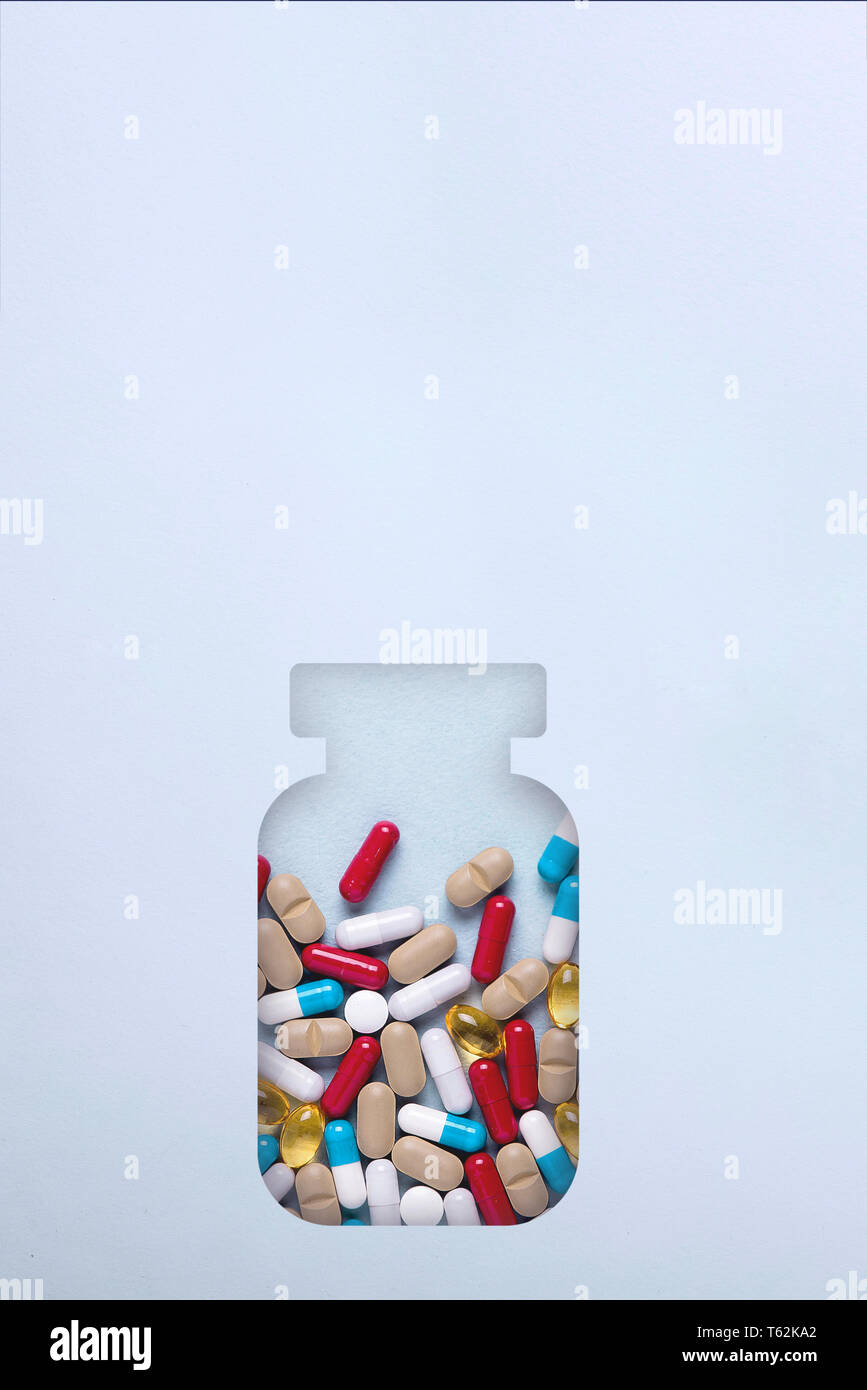 Bottle with different pills and pills Minimalism. Concept of first aid ...
