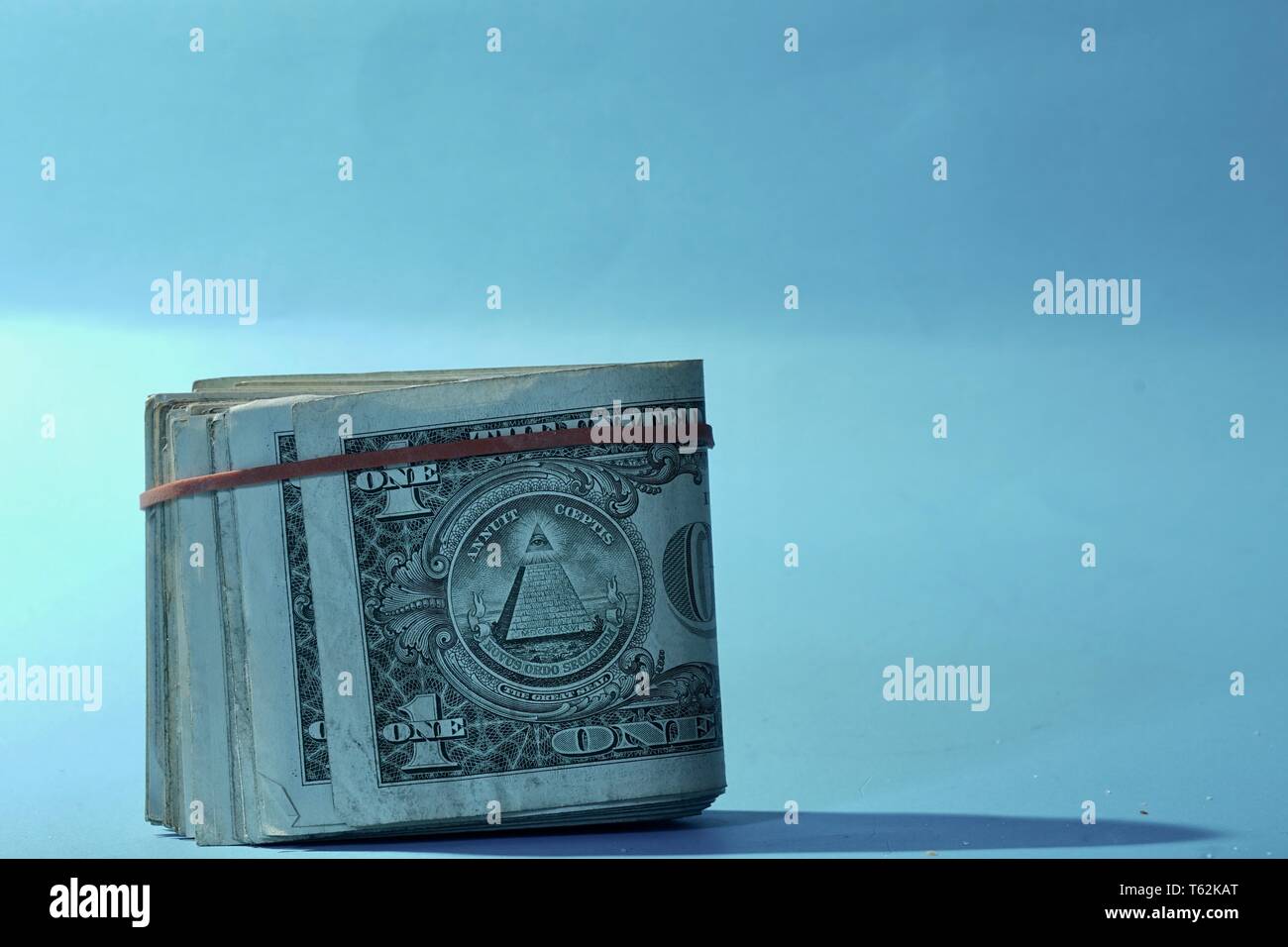 a nice small bundle of American banknotes Stock Photo - Alamy