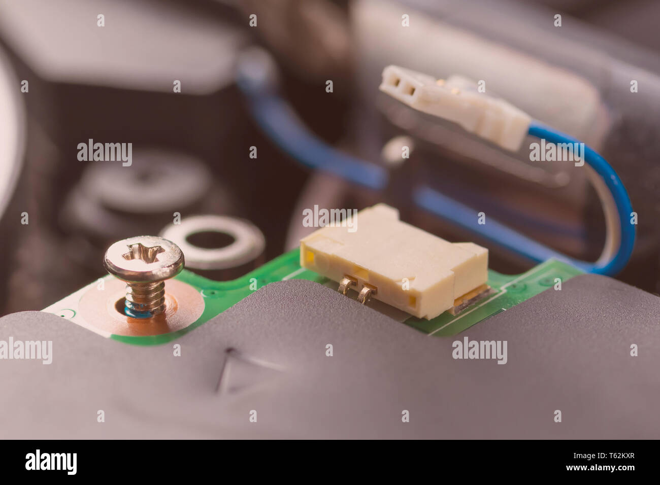 Metal bolt fastening. Computer connector and cable on the processor ...