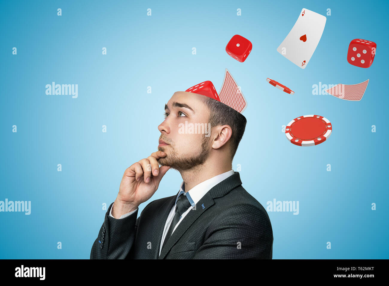 Side close-up of young handsome businessman rubbing chin, upper part of ...