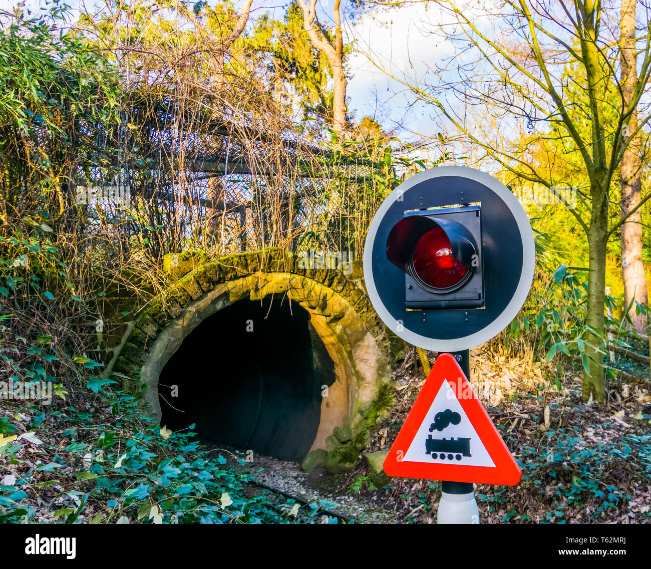 Tunnel with warning sign hi-res stock photography and images - Alamy