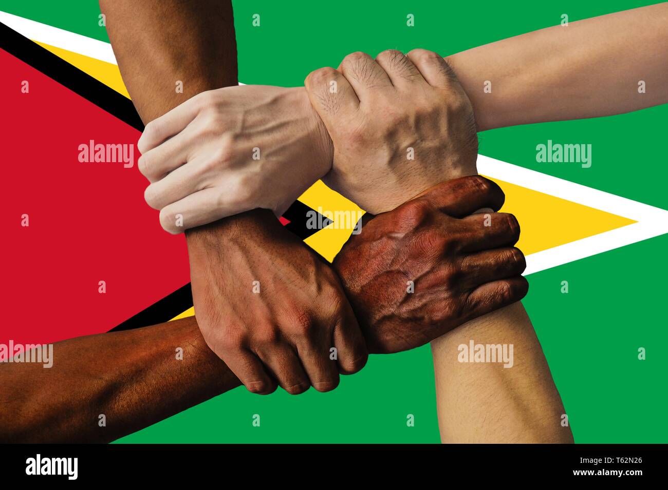 Flag of Guyana, intergration of a multicultural group of young people ...