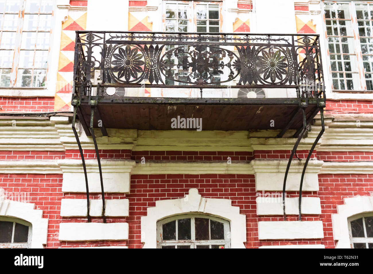 Beautiful metal forged French balcony in an old stone house ...