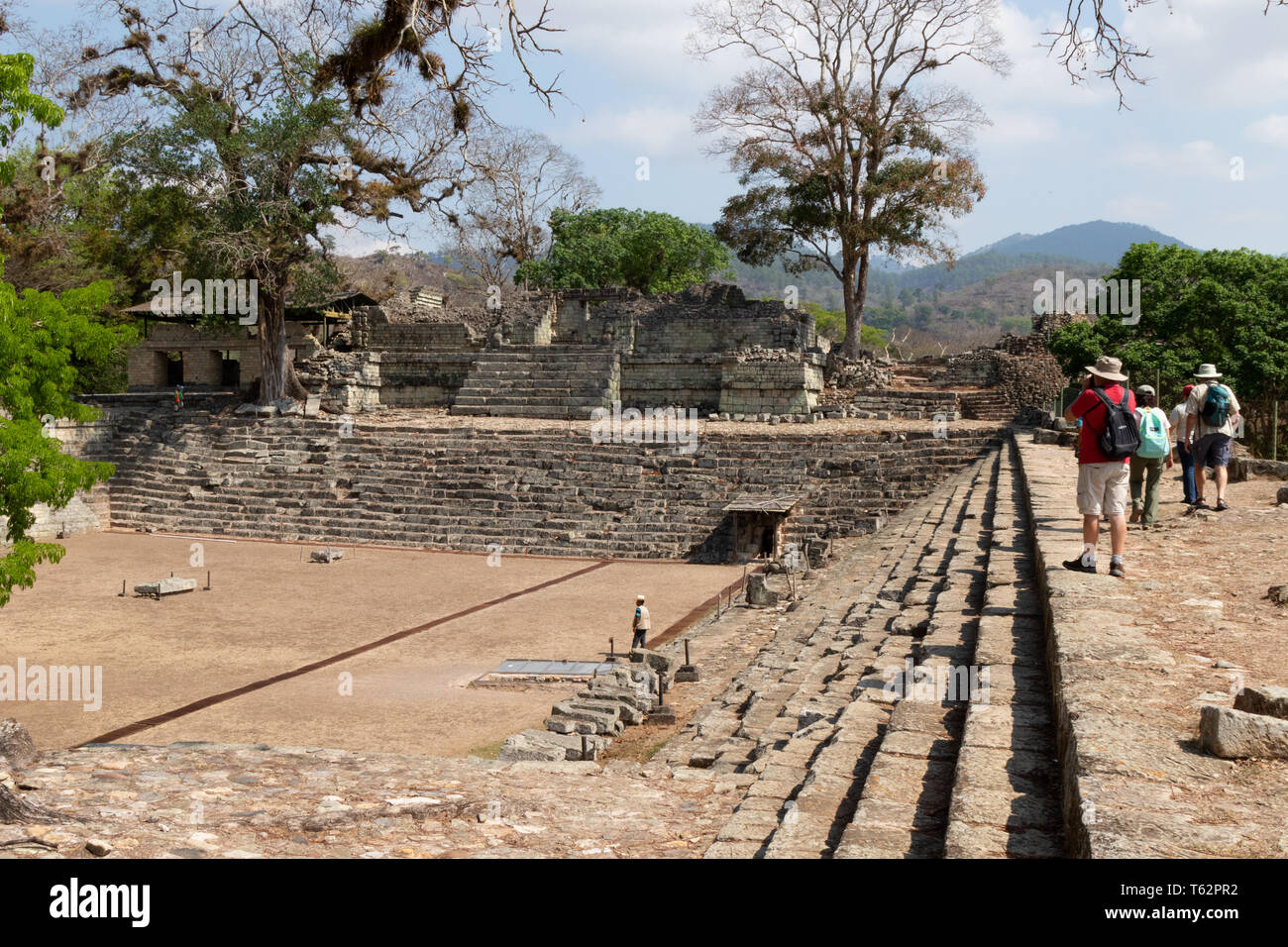 Copan Honduras travel - tourists looking at the ancient mayan ruins at Copan UNESCO World ...