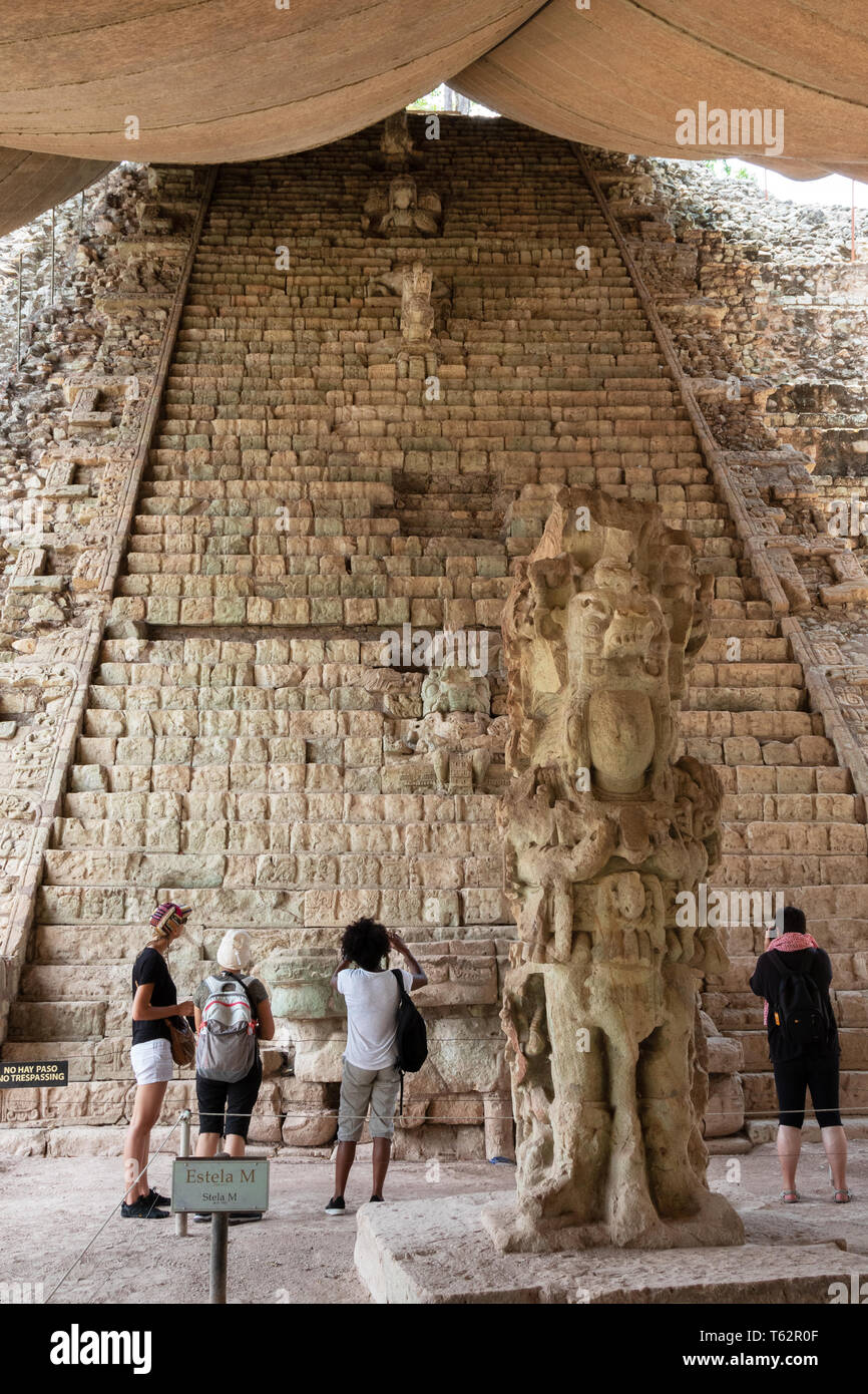 Copan Honduras Tourists at the Hieroglyphic Stairway, with Stela M at the base, Copan Mayan ...