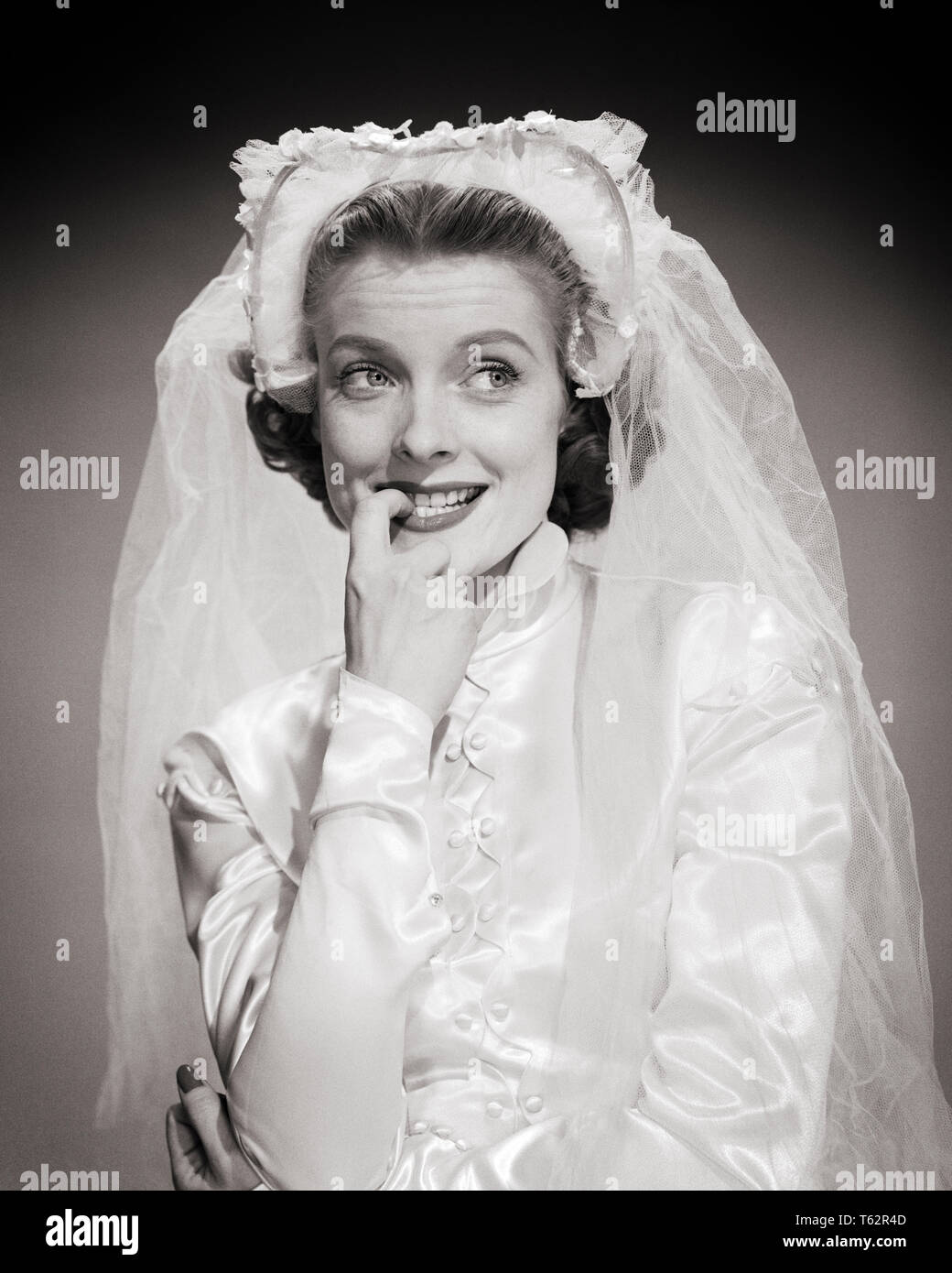 Woman coy shy expression hi-res stock photography and images - Alamy