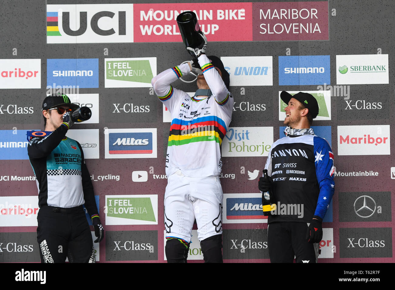 Second Danny Hart of Great Britain (L), first Loic Bruni of France (C ...