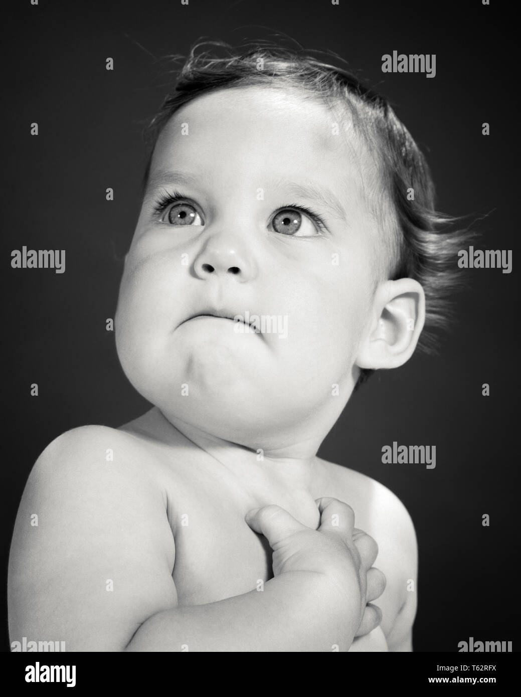Hand chest 1960s hi-res stock photography and images - Alamy