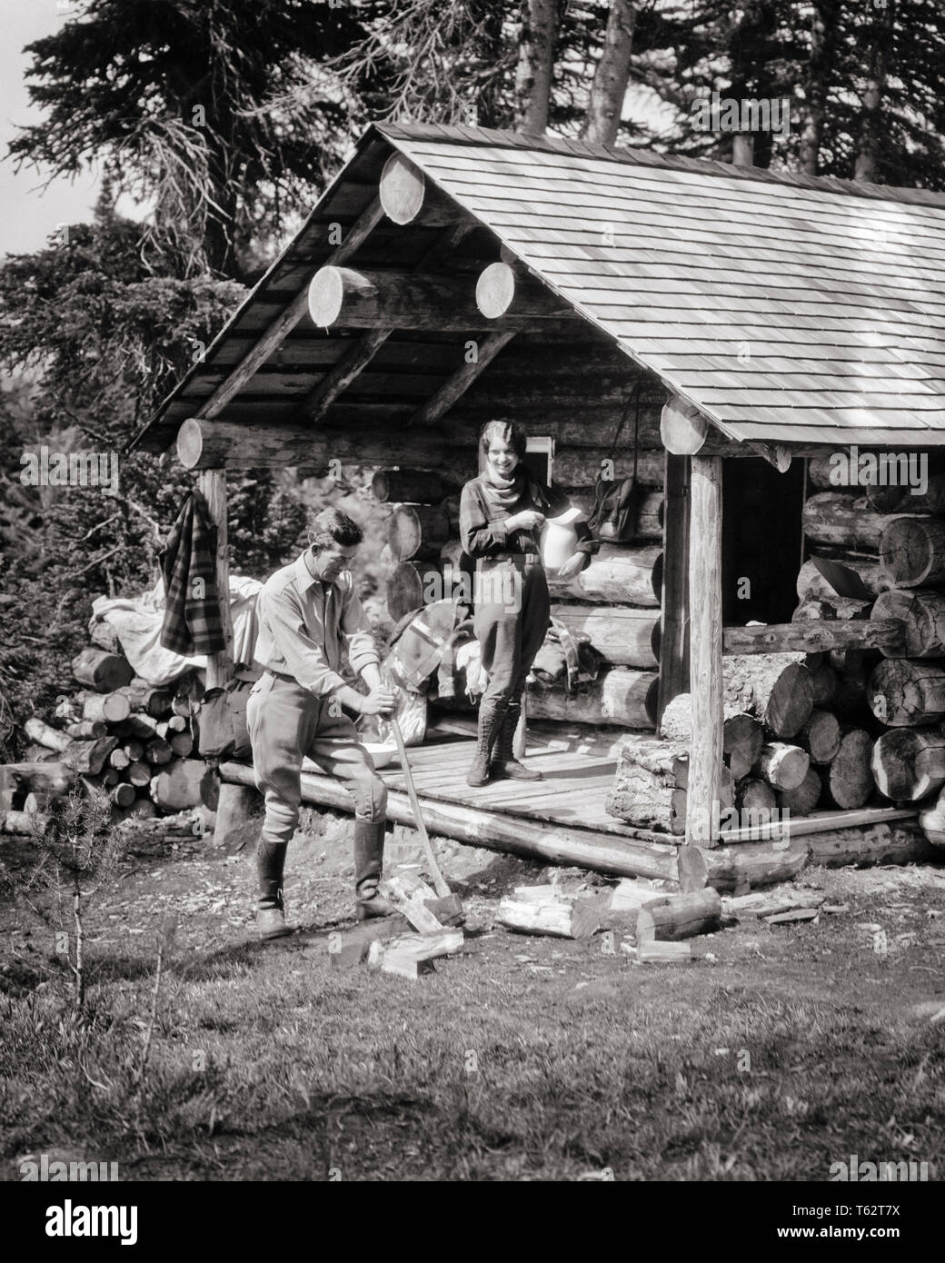 1920s COUPLE LIVING VACATIONING OFF THE GRID IN LOG CABIN WOMAN ...