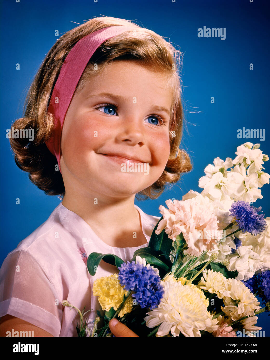 Child girl bouquet flowers 1960s hi-res stock photography and images ...