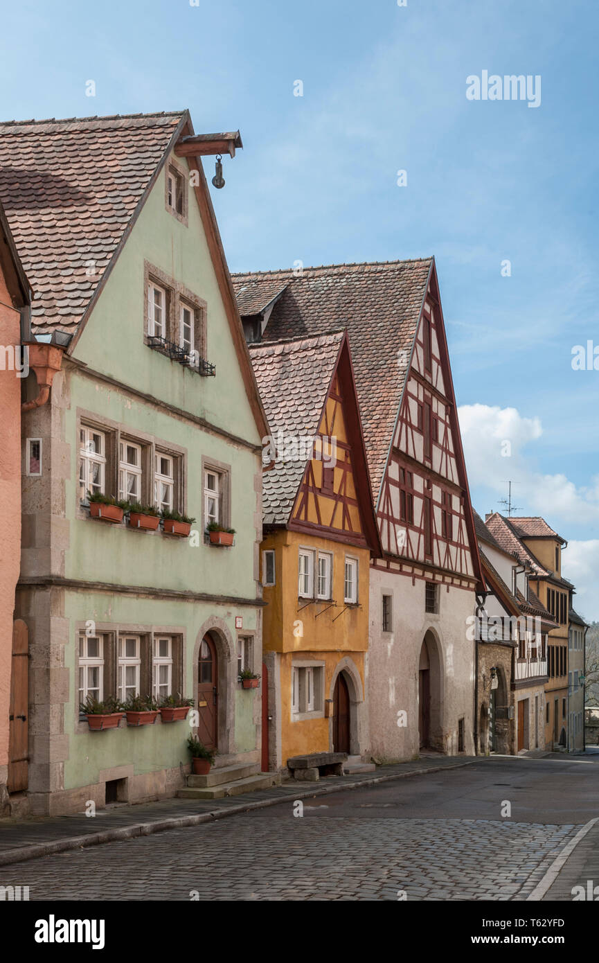 Historic colorful half-timbered houses in the medieval town Rothenburg ...