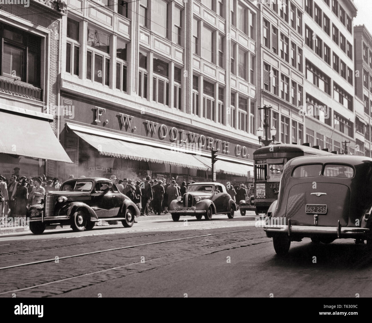 1930s 1940s WOOLWORTH STORE MARQUEE SIDEWALK PEDESTRIANS AND STREET ...