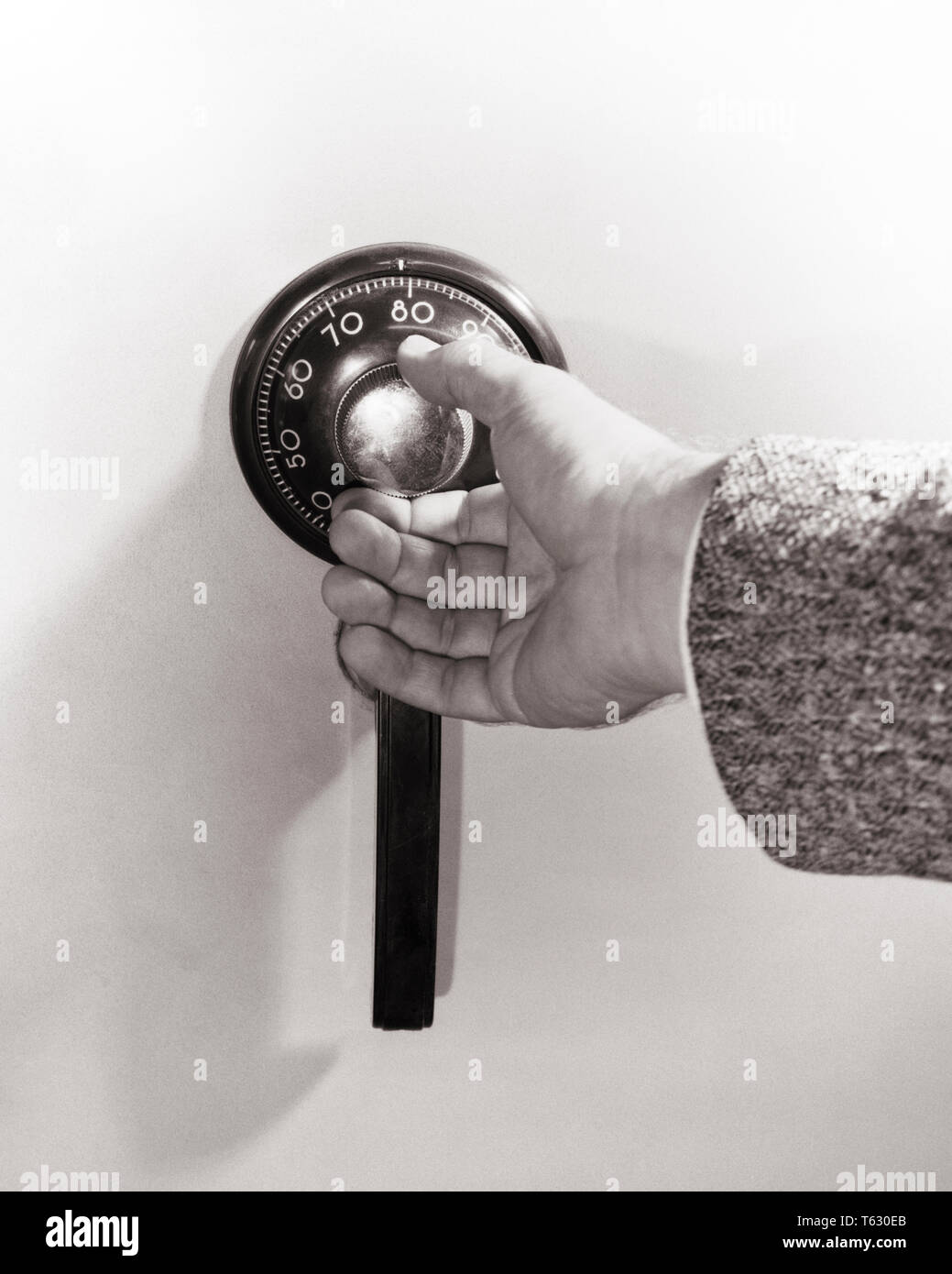 Old fashioned safe combination dial hi-res stock photography and images ...