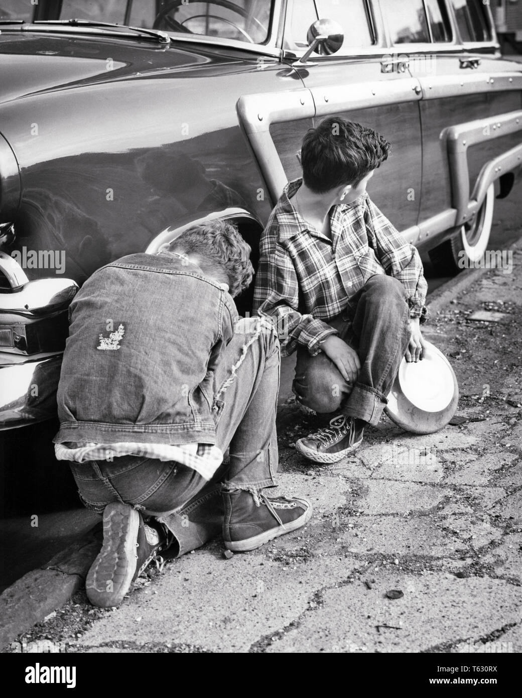 Boy stealing clothes hi-res stock photography and images - Alamy