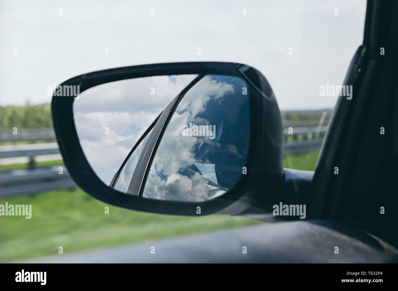 Landscape in the sideview mirror of a car Stock Photo - Alamy