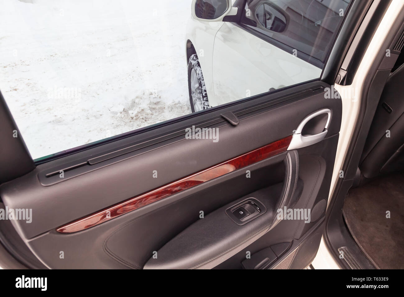 Sunblind on the glass of the rear door of the car black color close-up ...