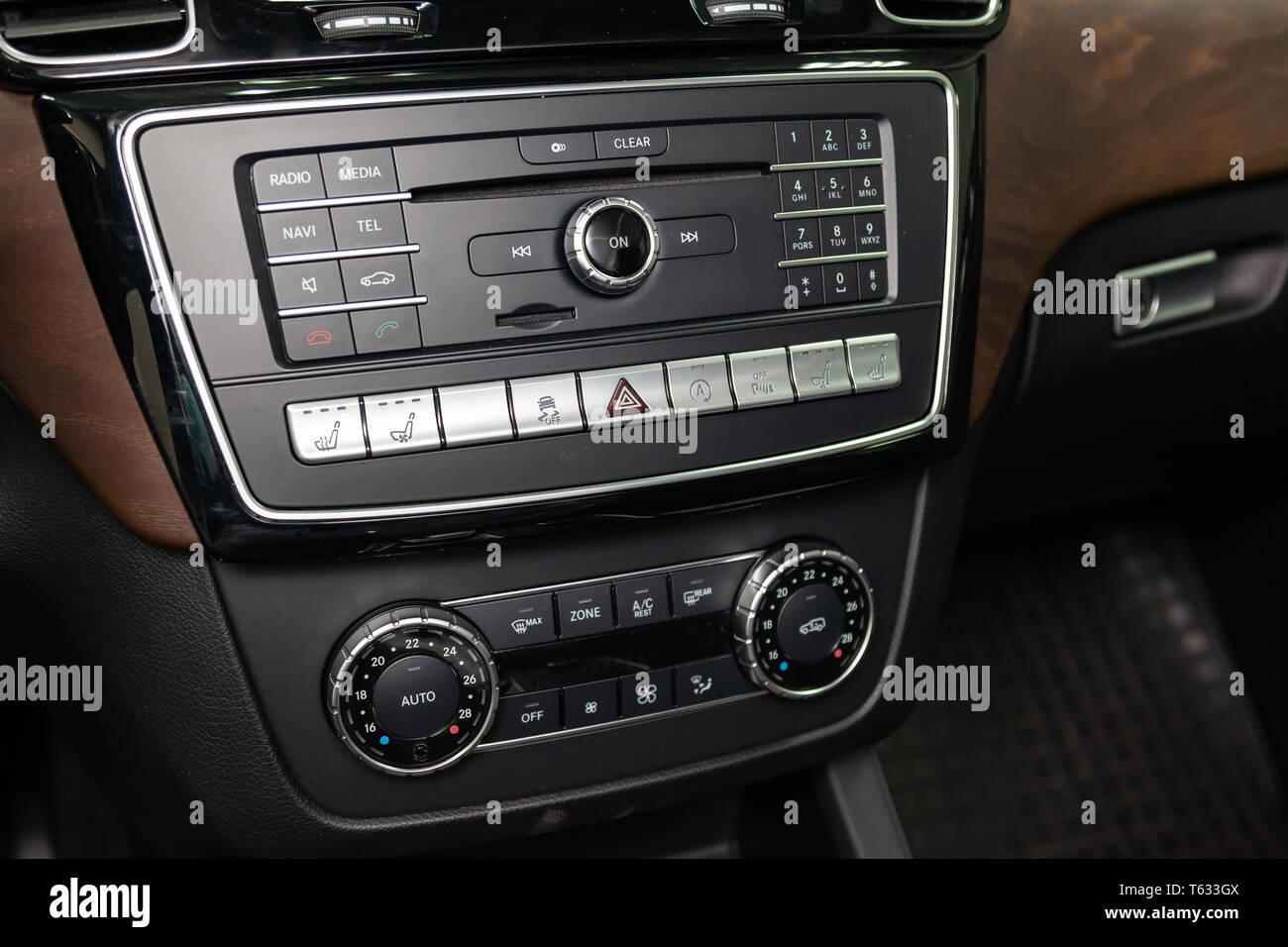 The central control console on the panel inside the car close-up with ...