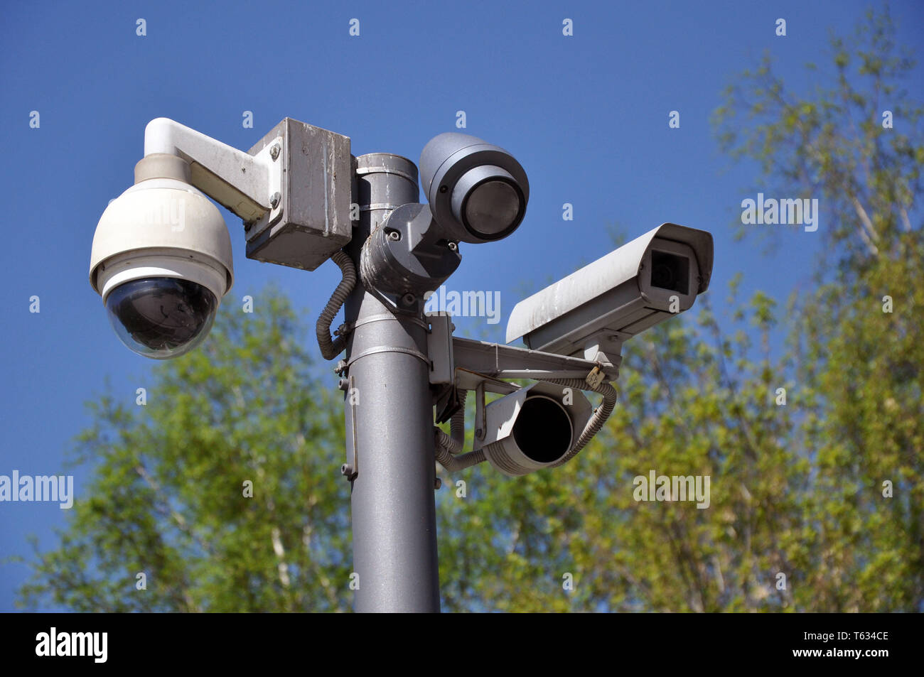 closed circuit camera Multi-angle CCTV system against the blue sky ...
