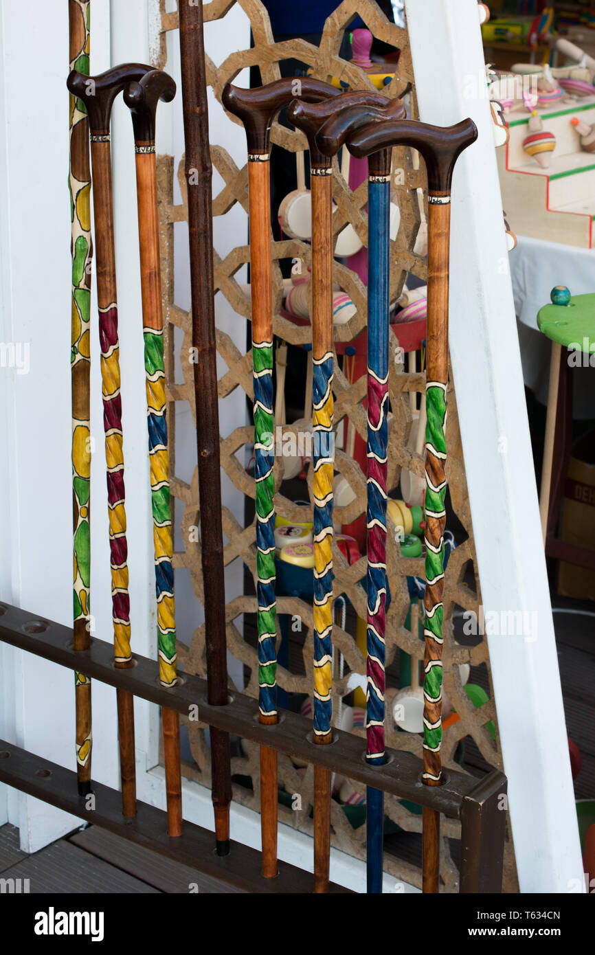 Colorful decorative wooden walking sticks in the view Stock Photo - Alamy