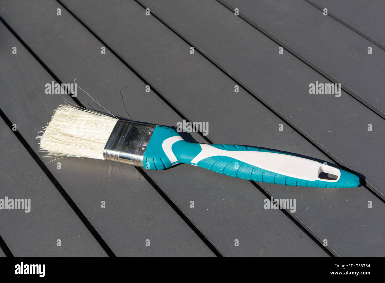 New paintbrush for tinkering with plastic handle Stock Photo - Alamy