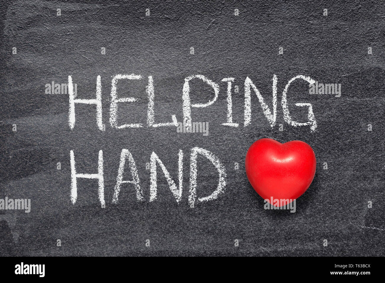 helping hand phrase written on chalkboard with red heart symbol Stock ...